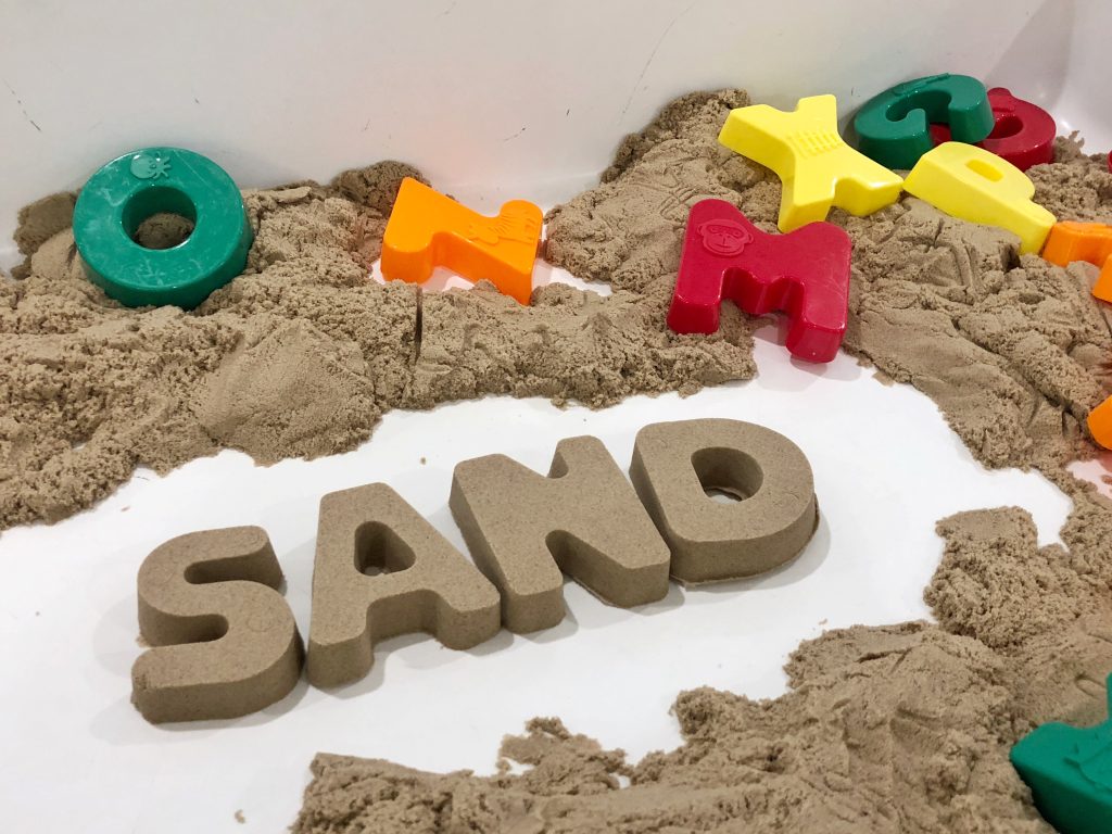Sensory Table Kinetic Sand Letter Molds - Play to Learn Preschool